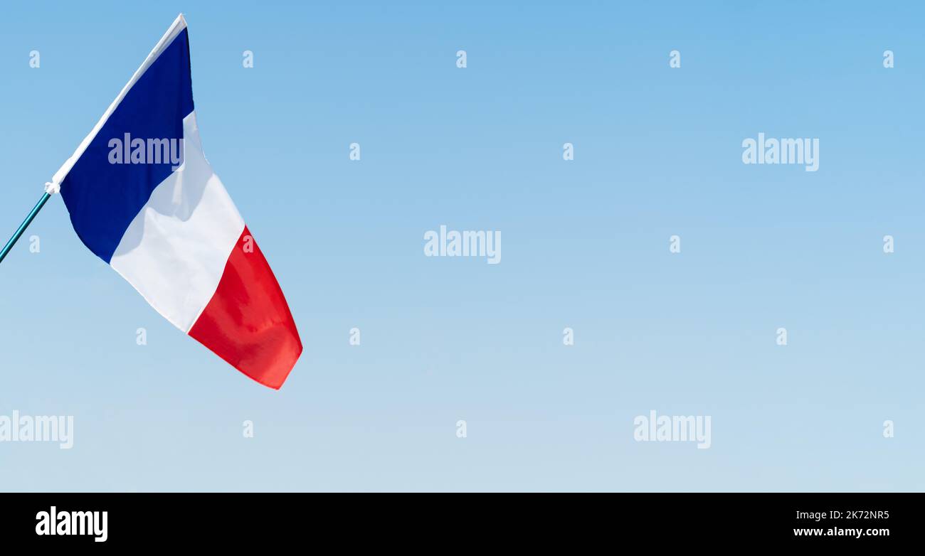 Flag of France waving in the wind in the sky Stock Photo - Alamy