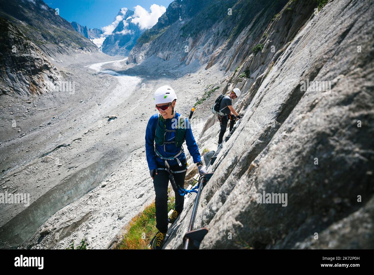 Climbers exploring mountains Stock Photo - Alamy