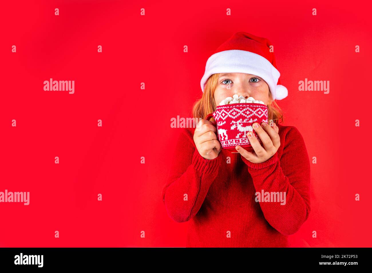 Funny caucasian girl with cup of Christmas cocoa. Happy cute european ...