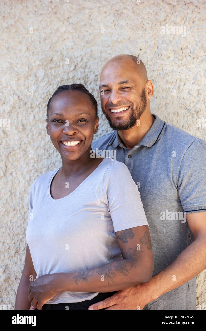 Portrait of mid adult couple Stock Photo - Alamy