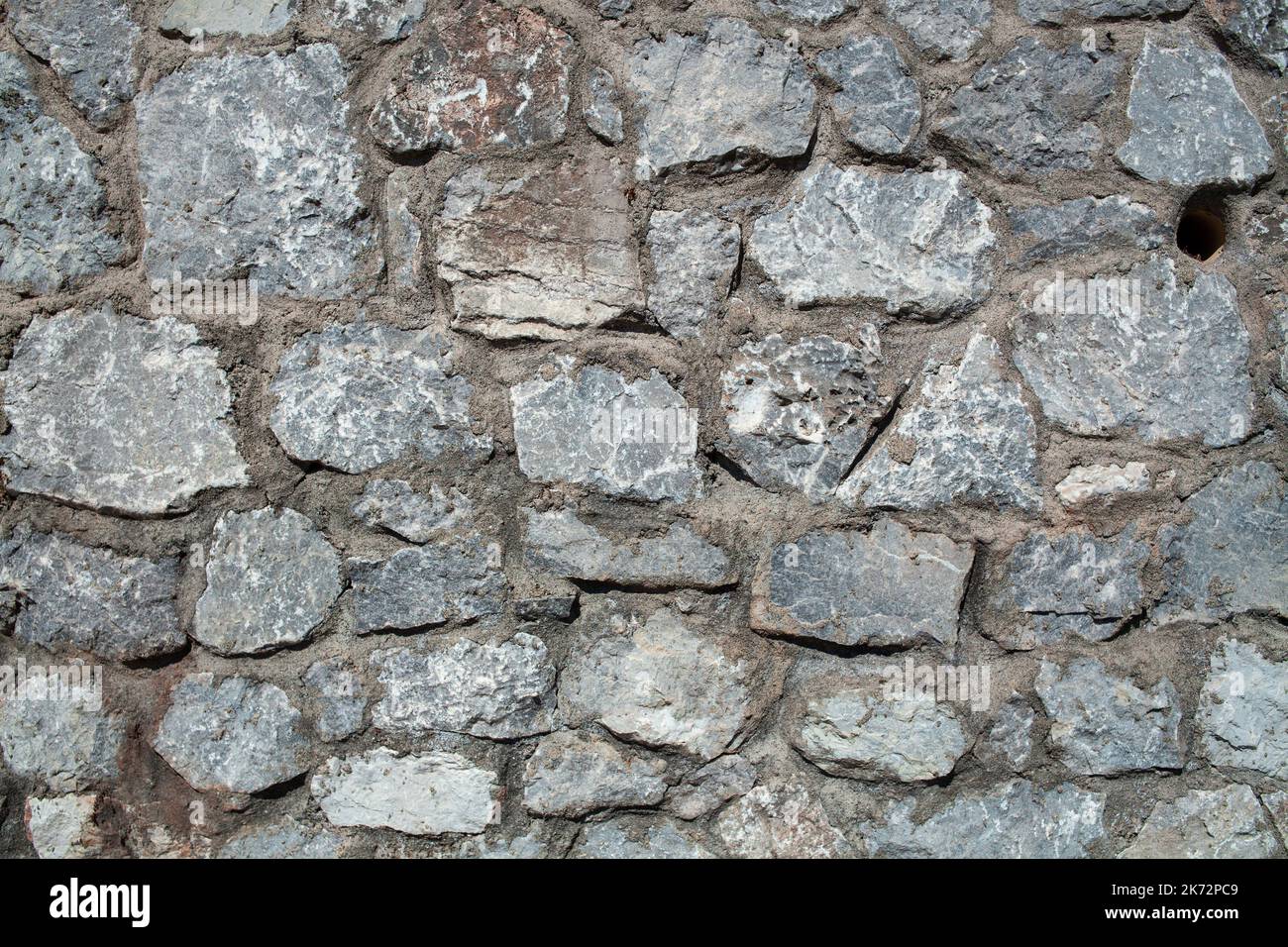Old stone wall texture background. Rough stone wall. Big rough stones fence Stock Photo - Alamy