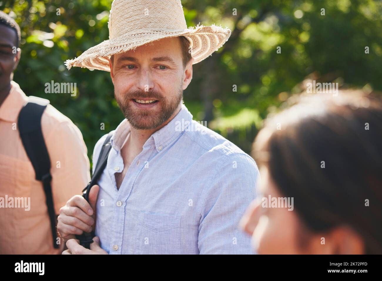 Friends walking together Stock Photo - Alamy