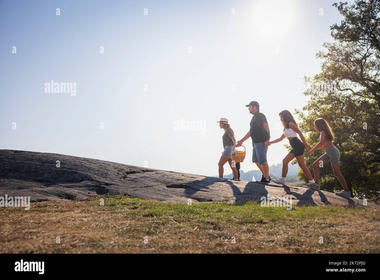 Mom dad girl walking hi-res stock photography and images - Alamy