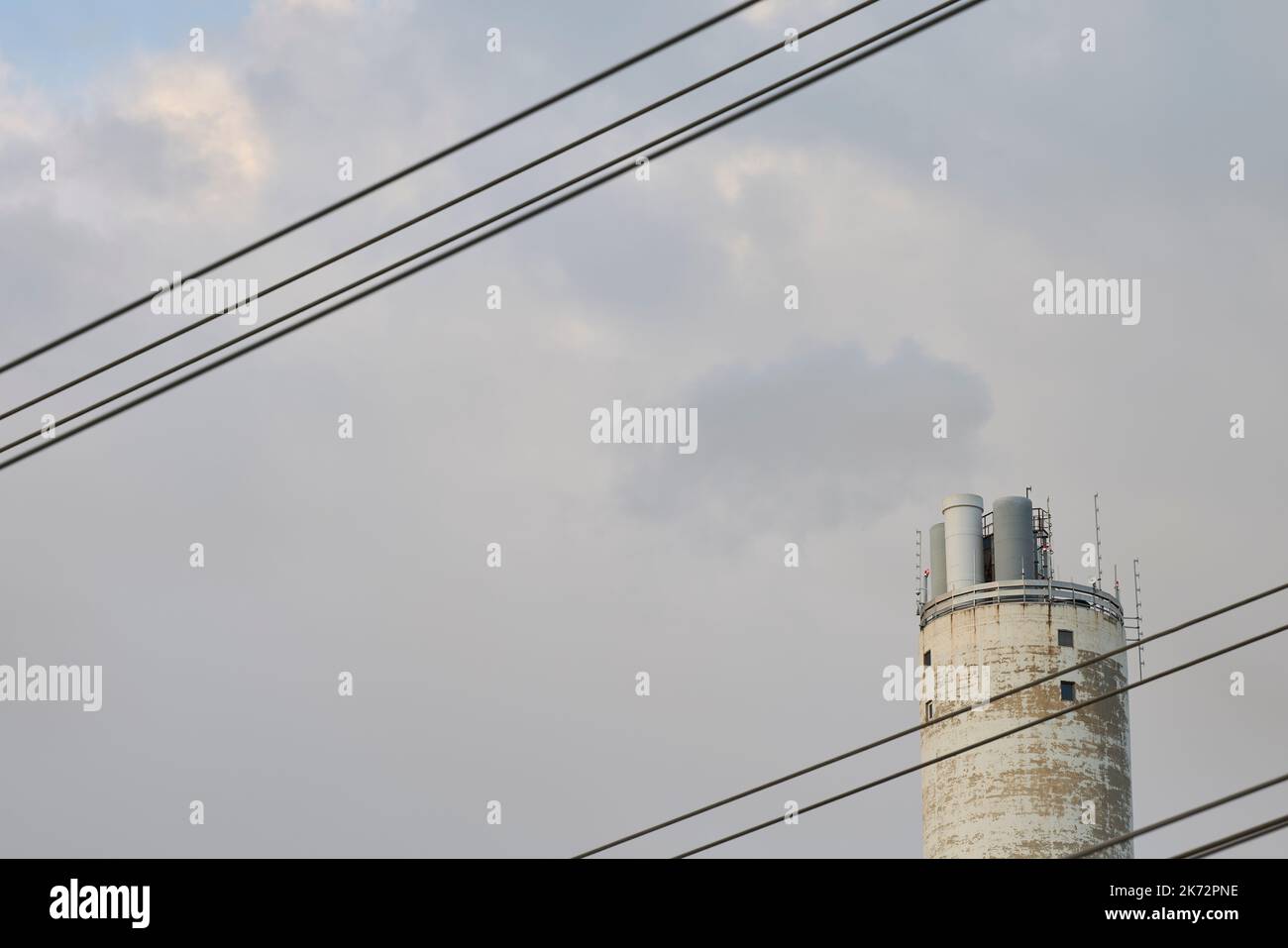 Electricity cables against sky Stock Photo - Alamy