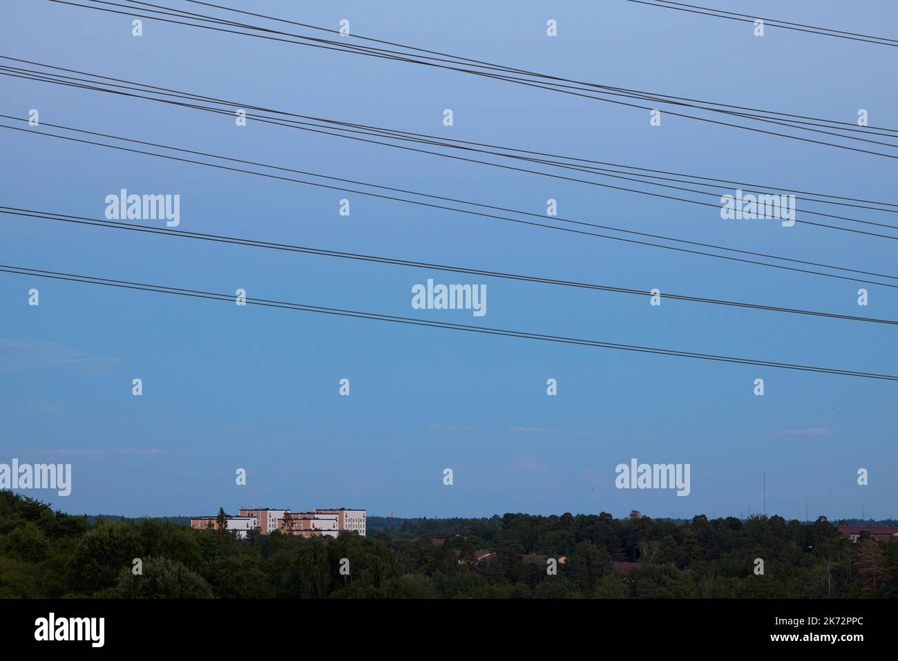 Electricity cables against sky Stock Photo - Alamy