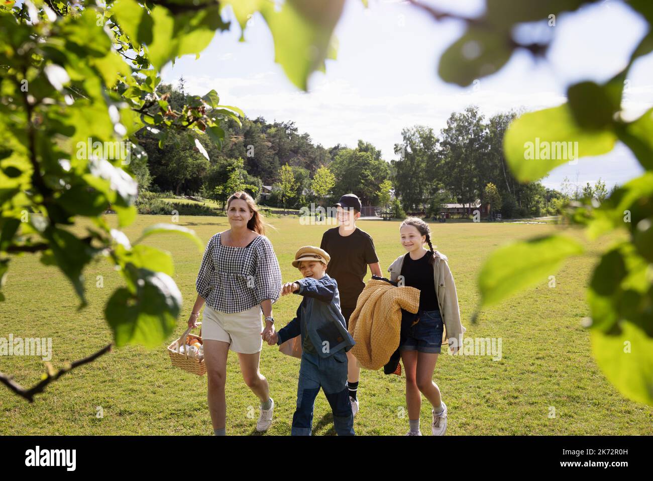 Family walking together Stock Photo - Alamy