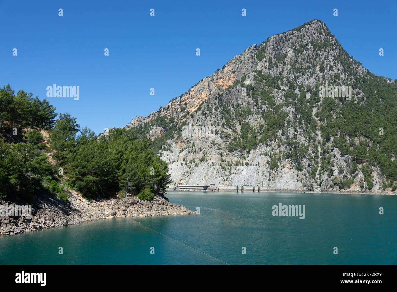 View of the lake and mountain cliffs in the area of the Oimapinar dam ...