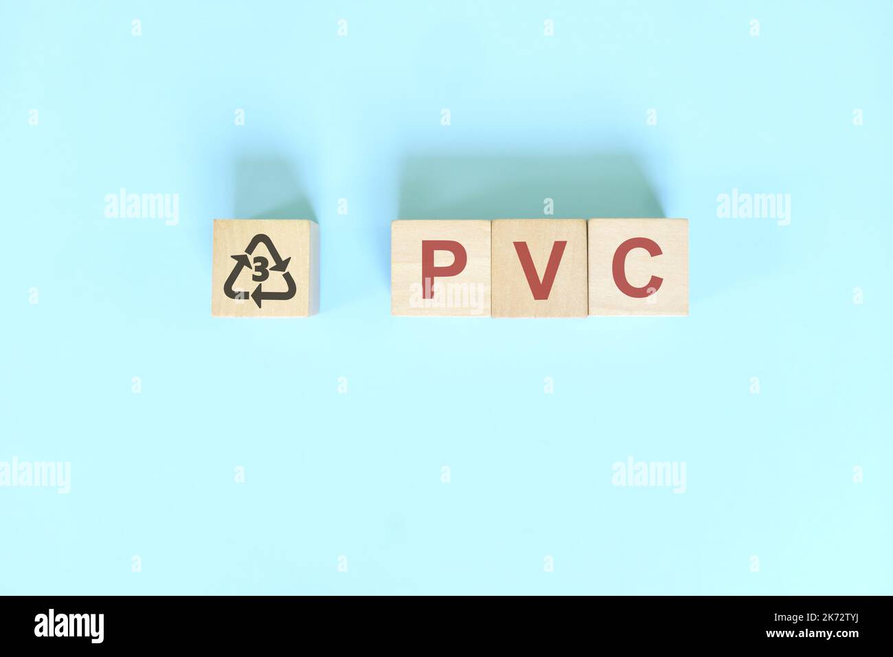 Recycling icon number 3 for PVC or polyvinyl chloride symbol on wooden ...