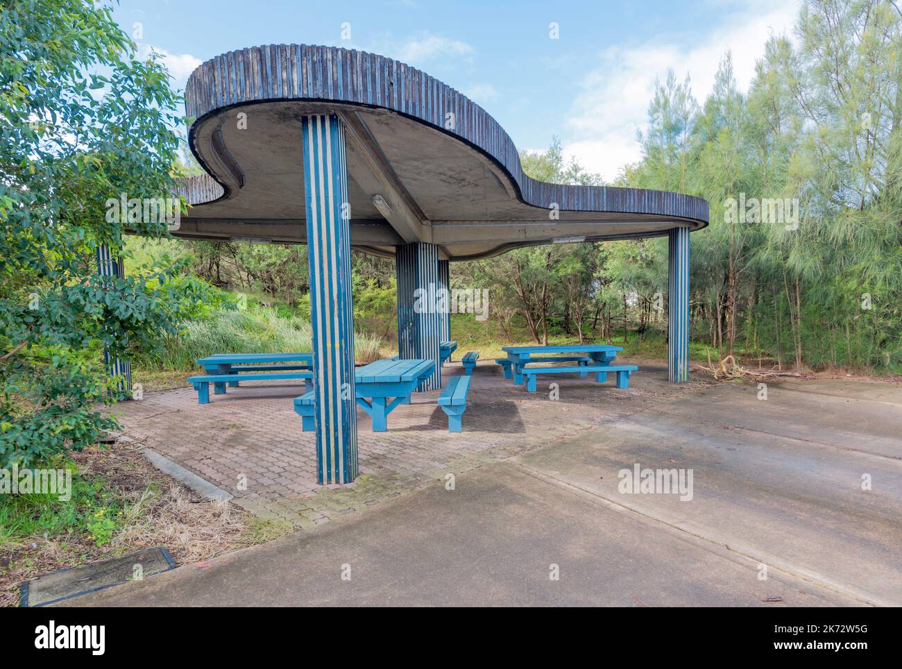 A covered set of picnic tables at Tempe Recreation Reserve has a ...