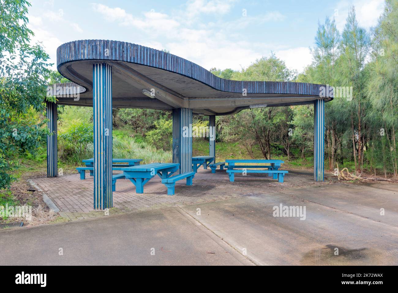A covered set of picnic tables at Tempe Recreation Reserve has a ...