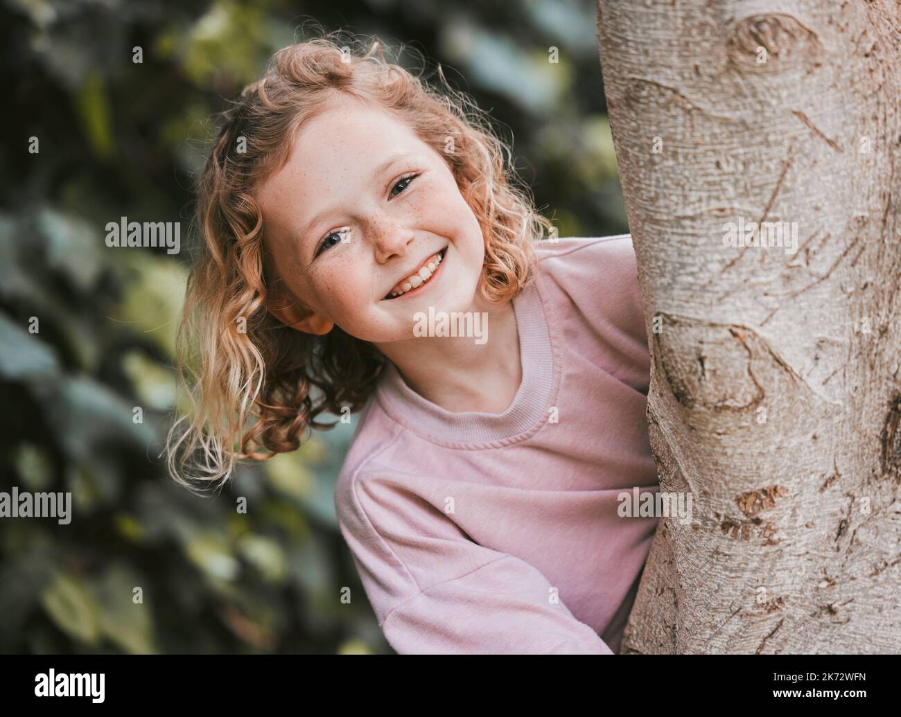 Be like a tree, grow every day. an adorable little girl hugging a tree ...