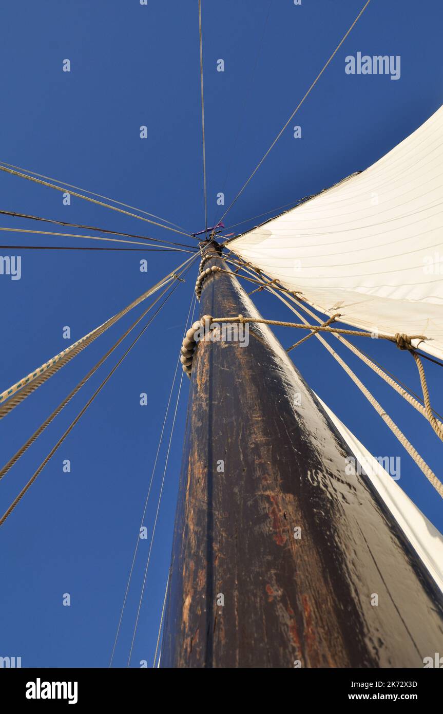 Mast and rigging of an old sailing ship photographed upwards into the ...