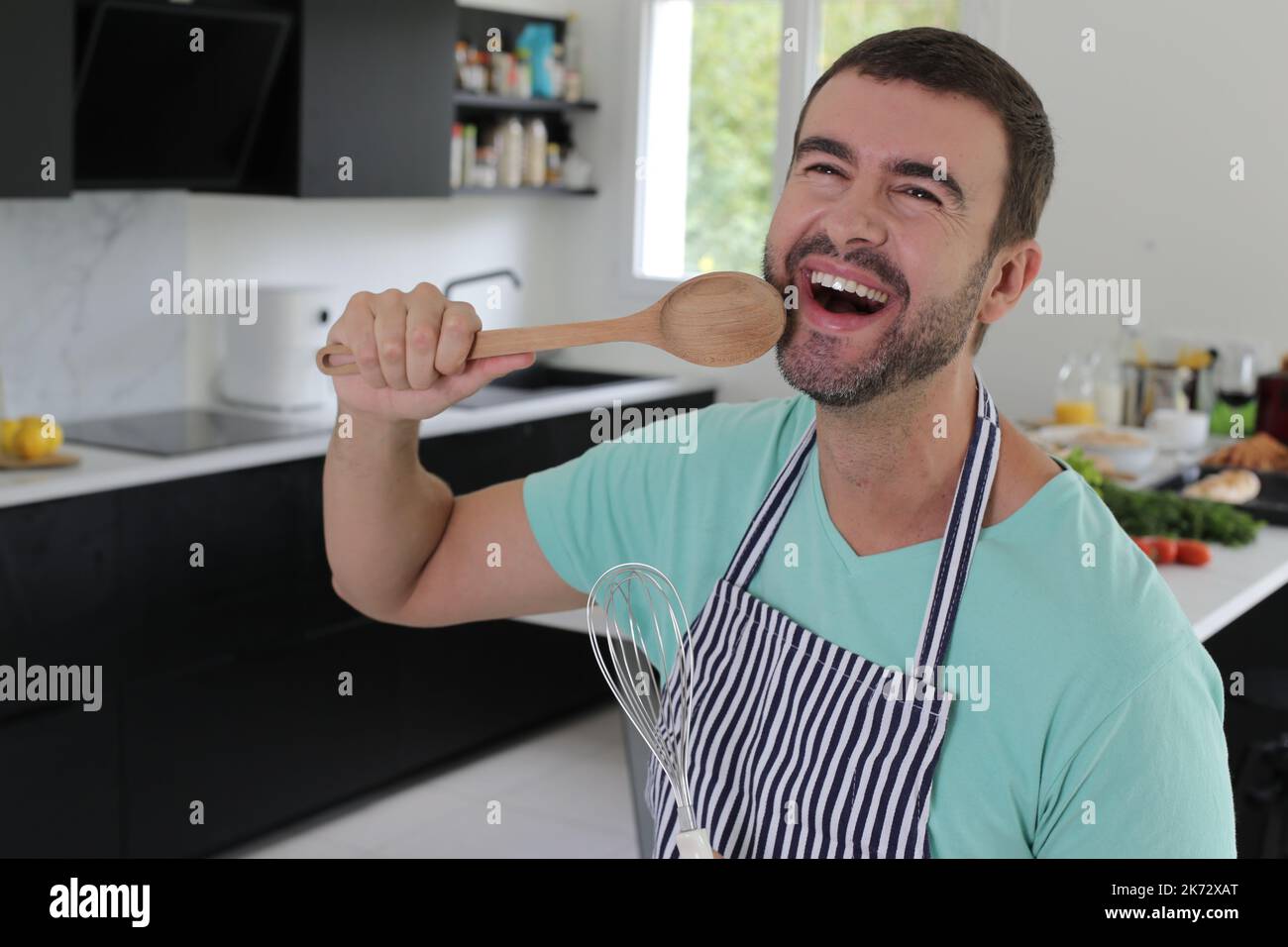 Cheerful man listening music singing hi-res stock photography and ...