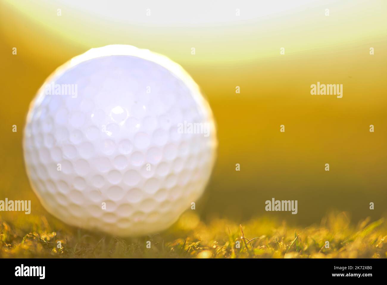 golf course background Golf balls on artificial grass with blur ...