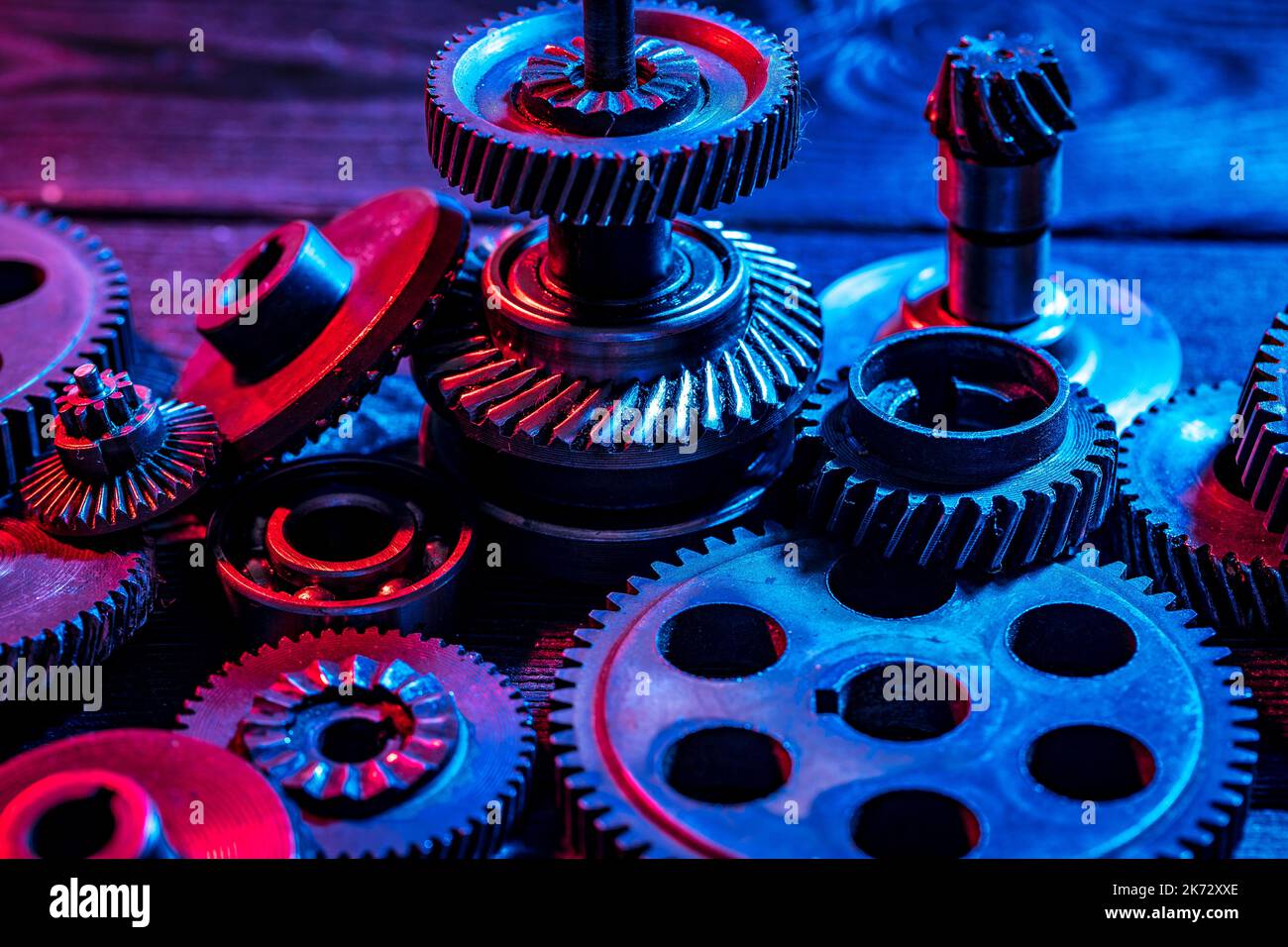 Gears. Machine part. Neon color Stock Photo - Alamy