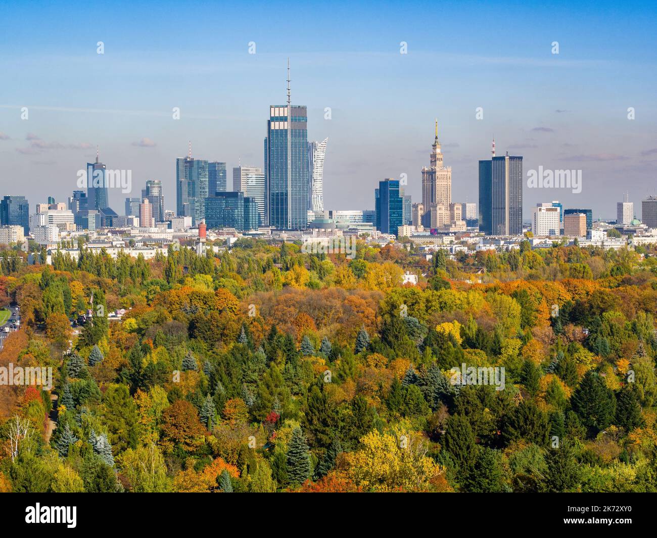 Autumn in Warsaw, colorful forest and distant city center aerial view ...