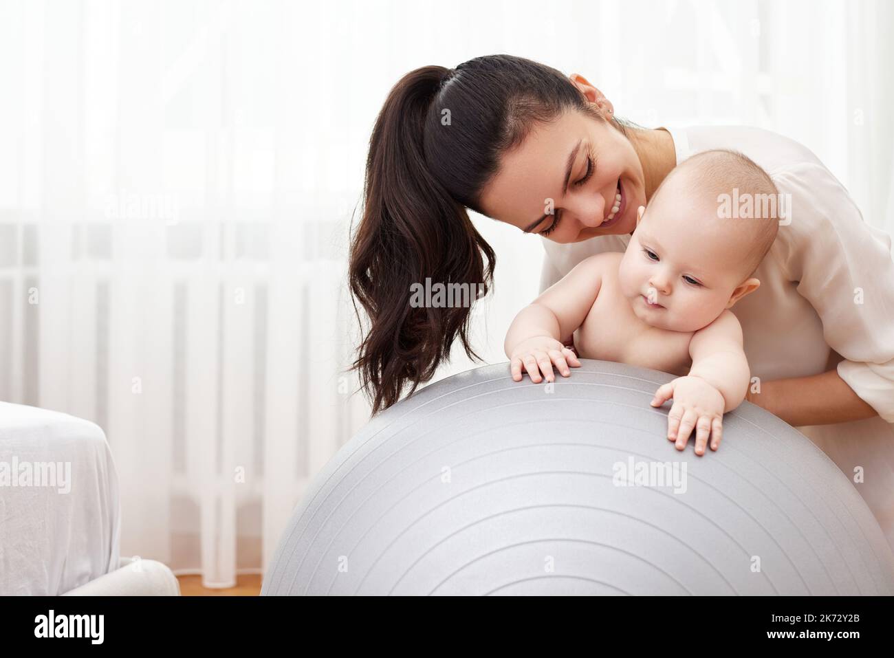 Child girl mother gymnastics hi-res stock photography and images - Alamy