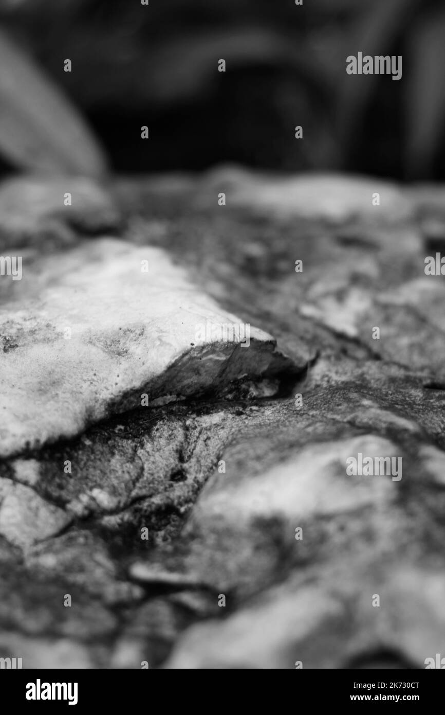 Rocky ledge of a natural stone in a black and white monochrome Stock ...