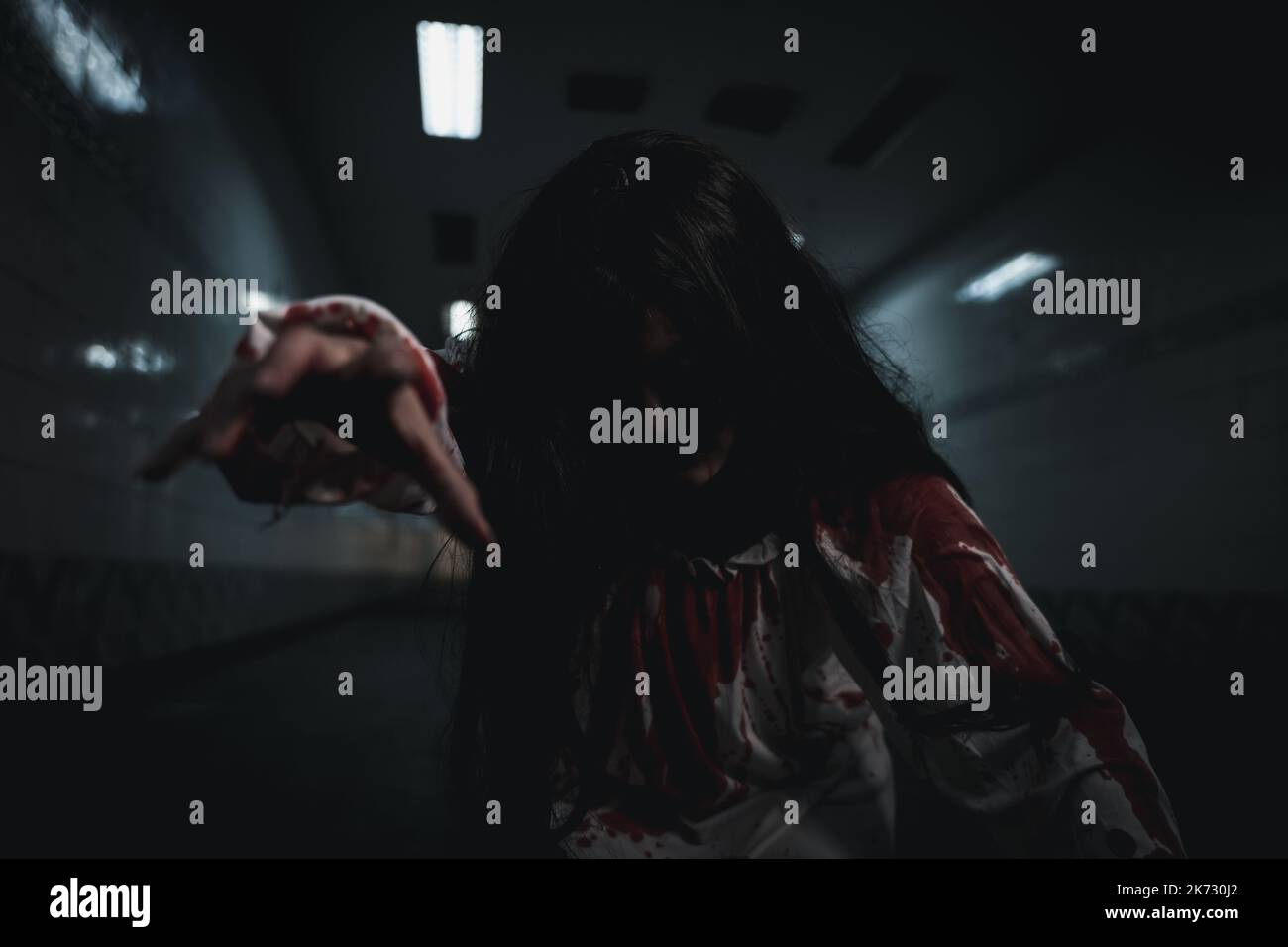 Bloody halloween makeup. Asian woman zombie with blood she death and ...