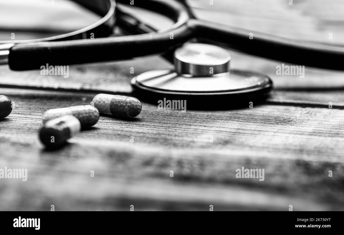 Medicare for all. Capsules and stethoscope wooden background. Medicare ...