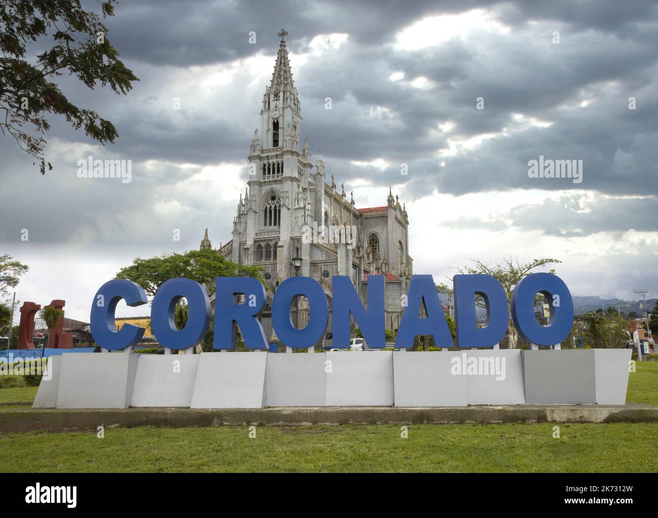 Coronado sign in front of old gothic church in Coronado, Costa Rica ...