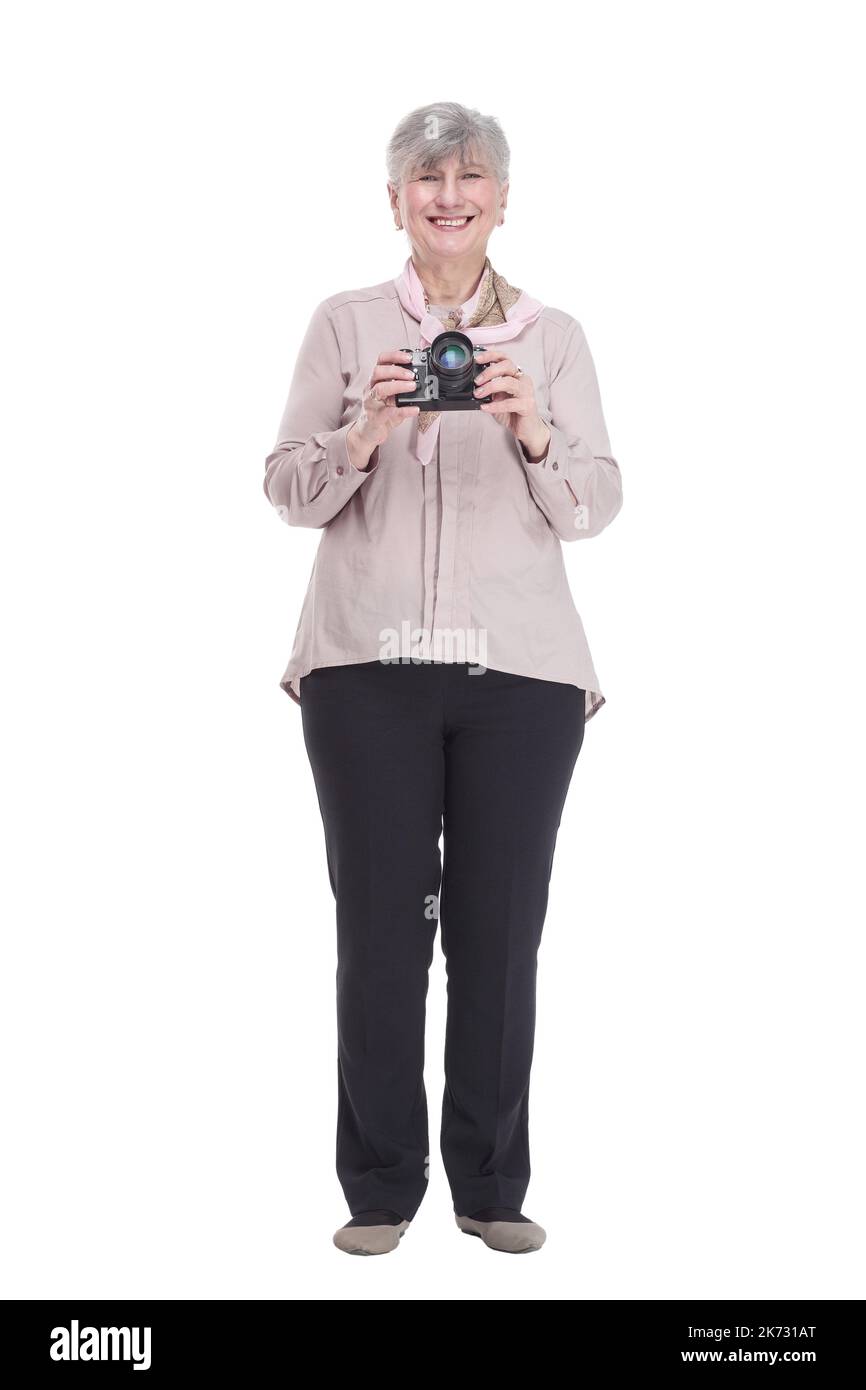 happy old lady with a camera in her hands. isolated on a white ...