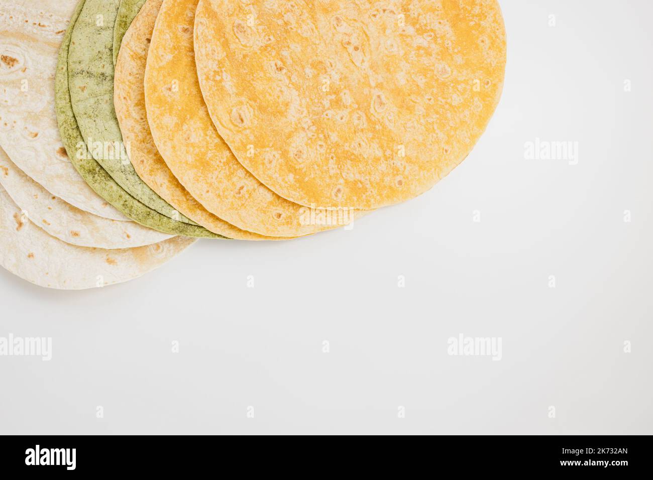 Tomato, spinach flavored and plain wheat tortilla wraps. Spanish or ...