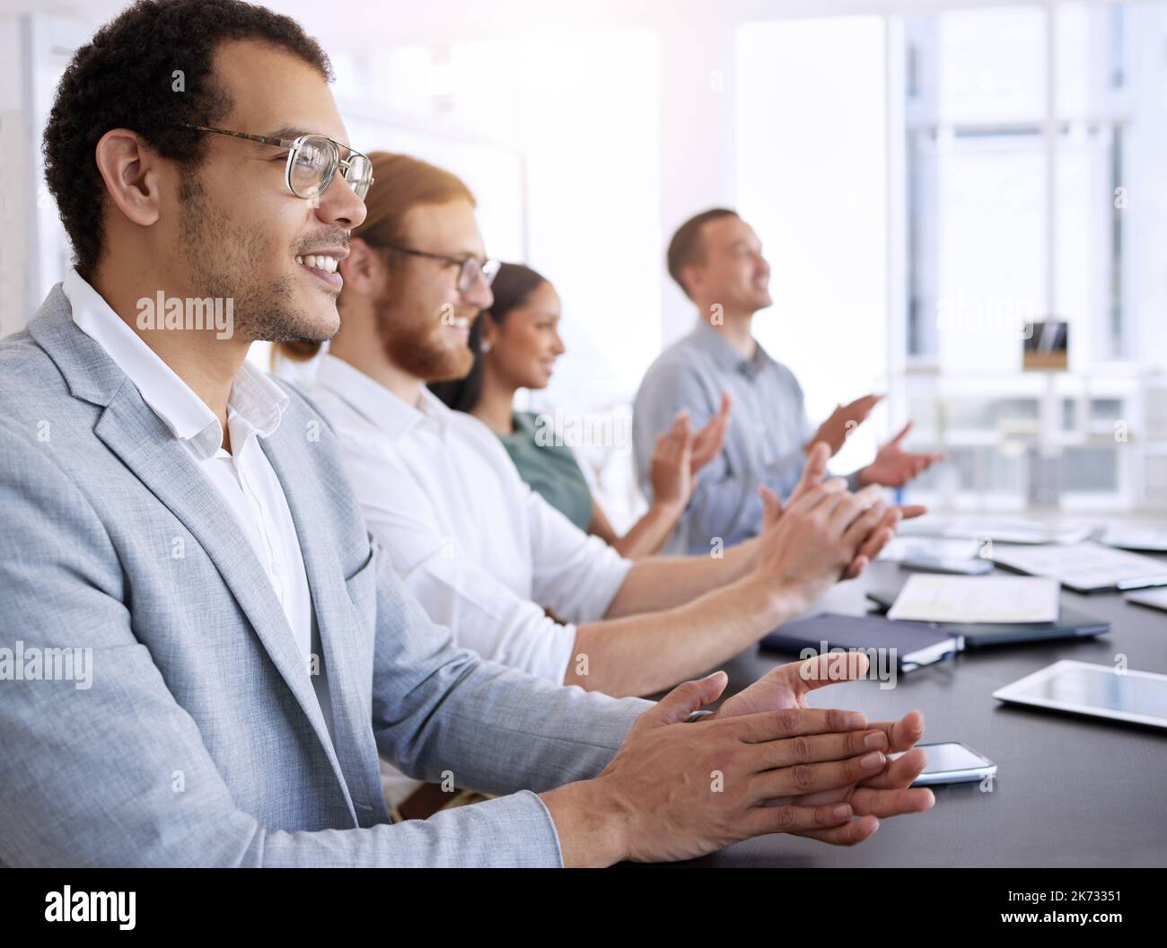 Business people clapping after meeting hi-res stock photography and ...