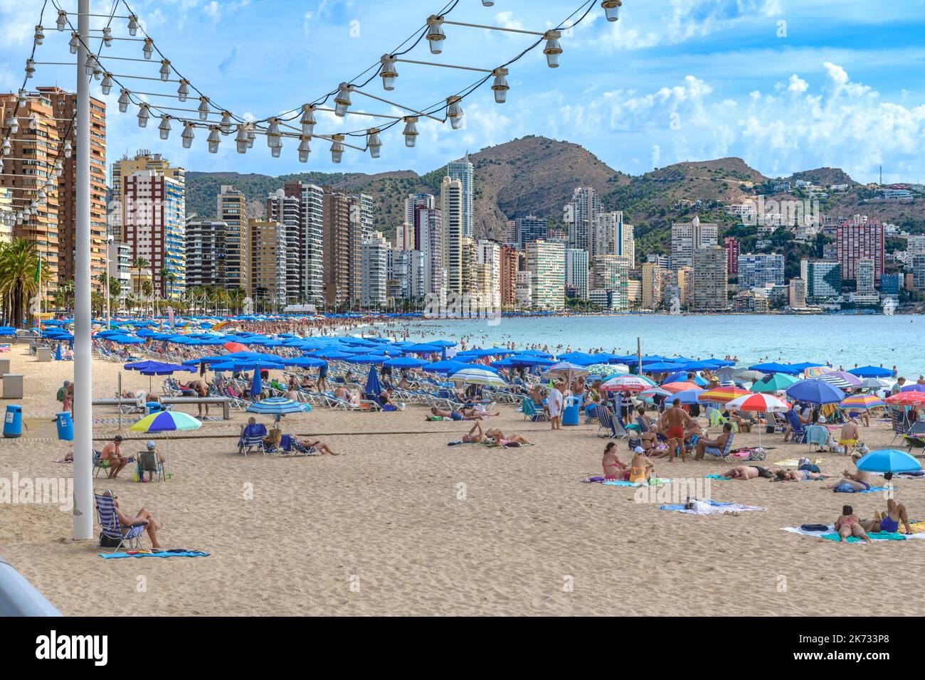 The popular, seafront, promenade and beaches on Levante Beach in Benidorm on the Costa Blanca ...