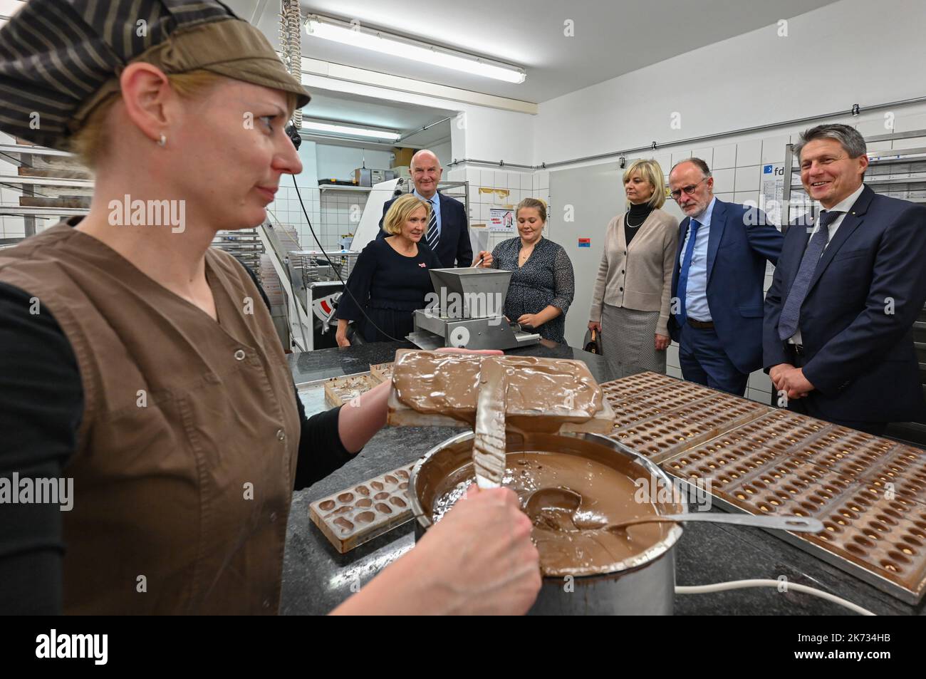 17 October 2022, Brandenburg, Hornow: Goedele Matthyssen (back l) with ...