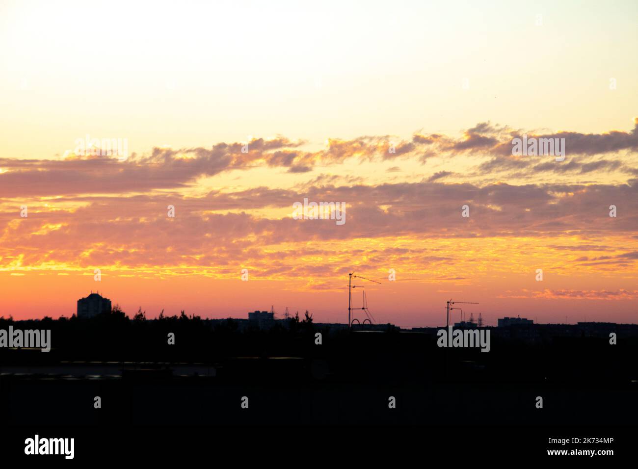 Cloudy night sky over city hi-res stock photography and images - Alamy