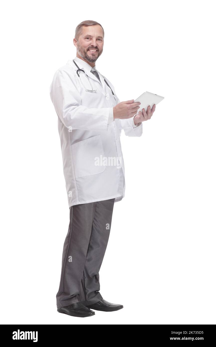 in full growth. smiling doctor with a digital tablet Stock Photo - Alamy