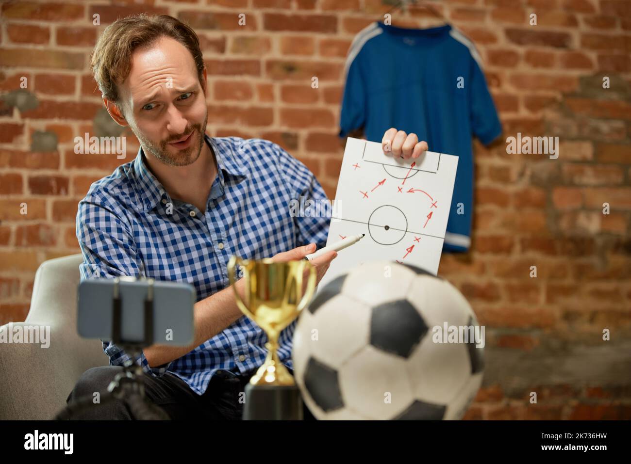 Emotional man, soccer fan recording vlog about last football match and ...