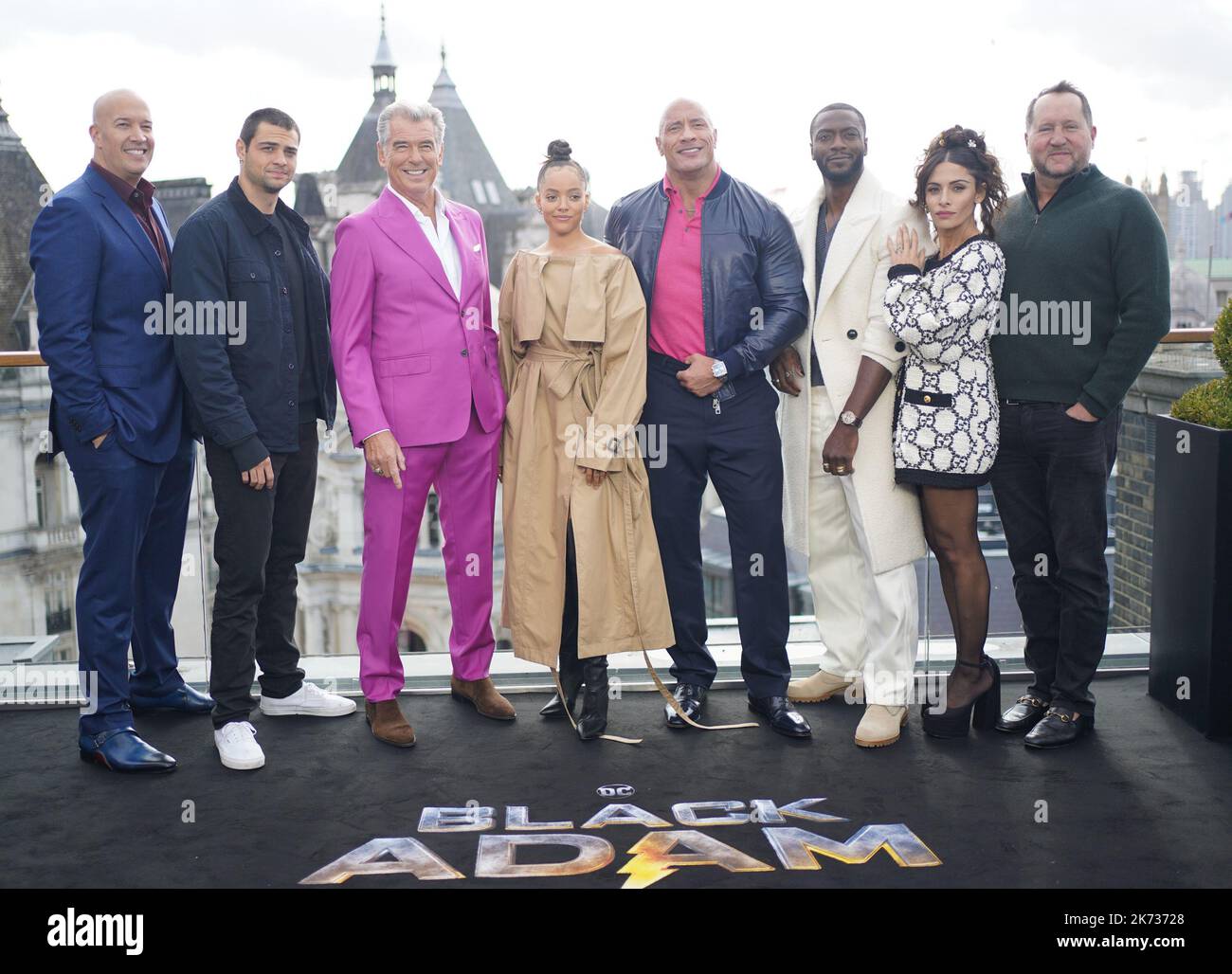 (left to right) Producer Hiram Garcia, Noah Centineo, Pierce Brosnan ...