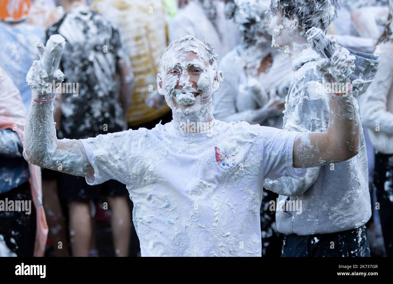 Hundreds of students take part in the traditional Raisin Monday foam ...