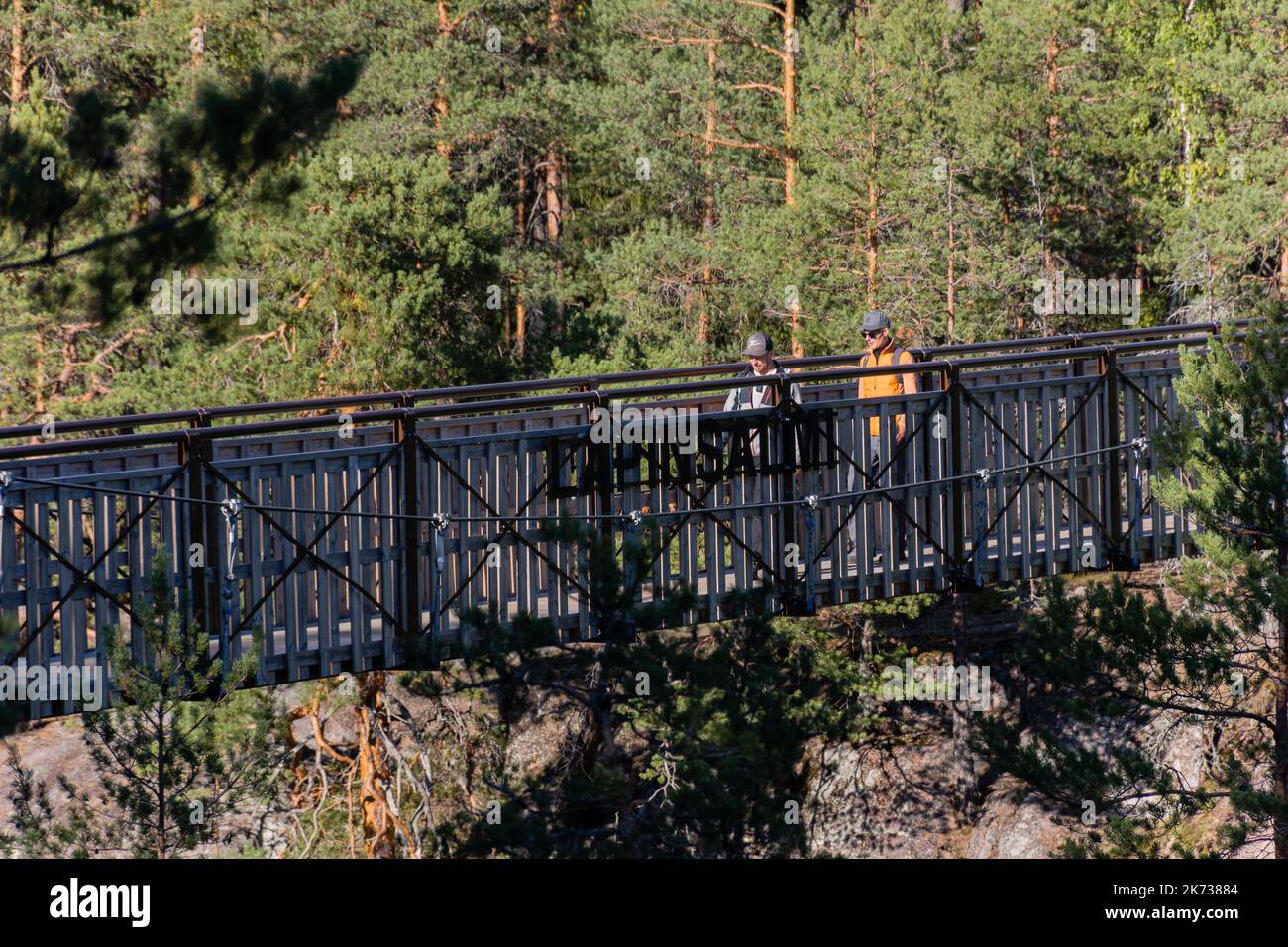 Kouvola, Finland. September 11, 2022. two people walking on new ...