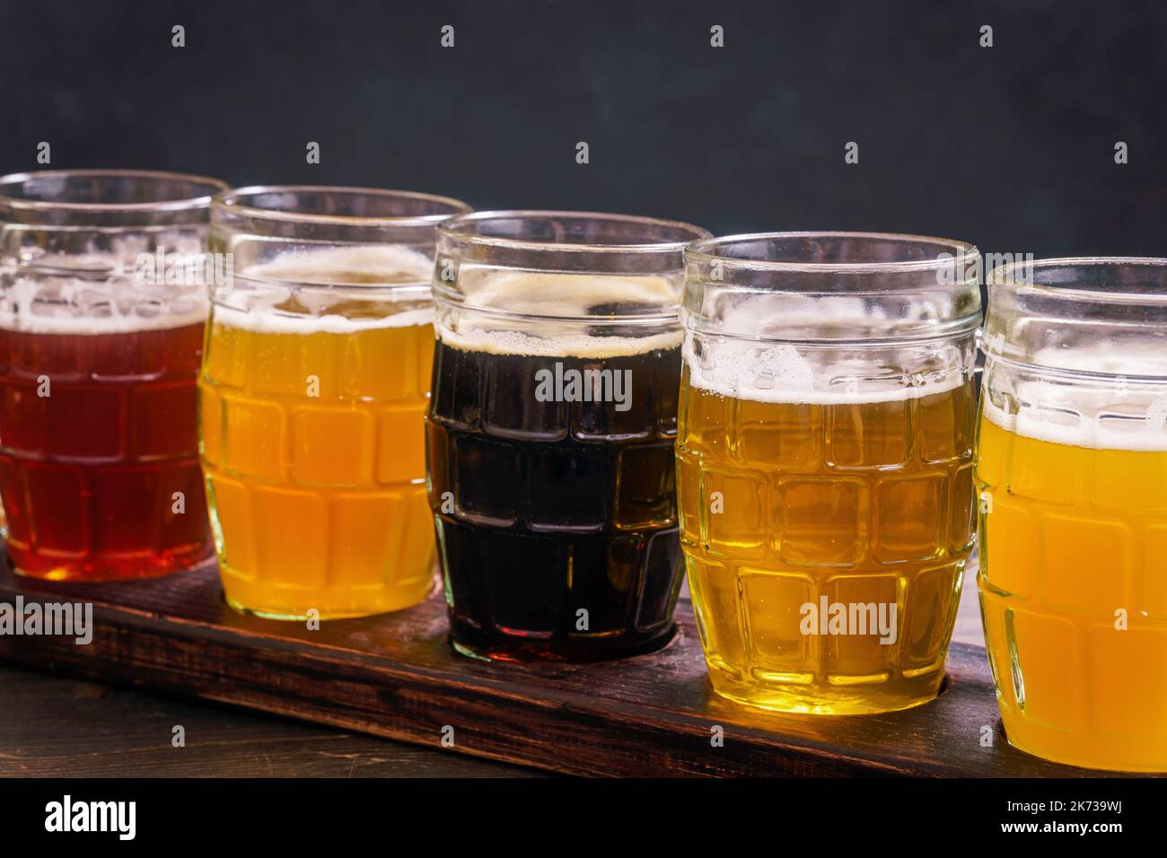 Tasting different types of beer close-up Stock Photo - Alamy