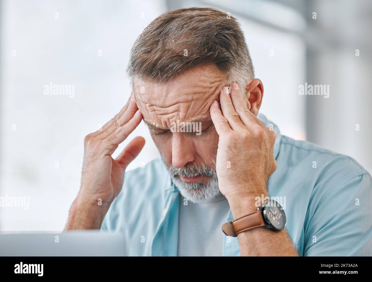 Man headache using laptop sitting hi-res stock photography and images ...