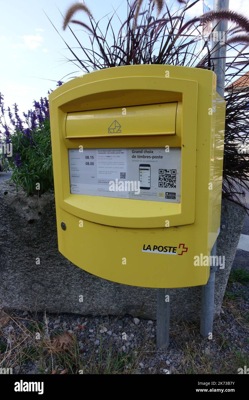 Pole mounted Swiss Post Box Stock Photo - Alamy
