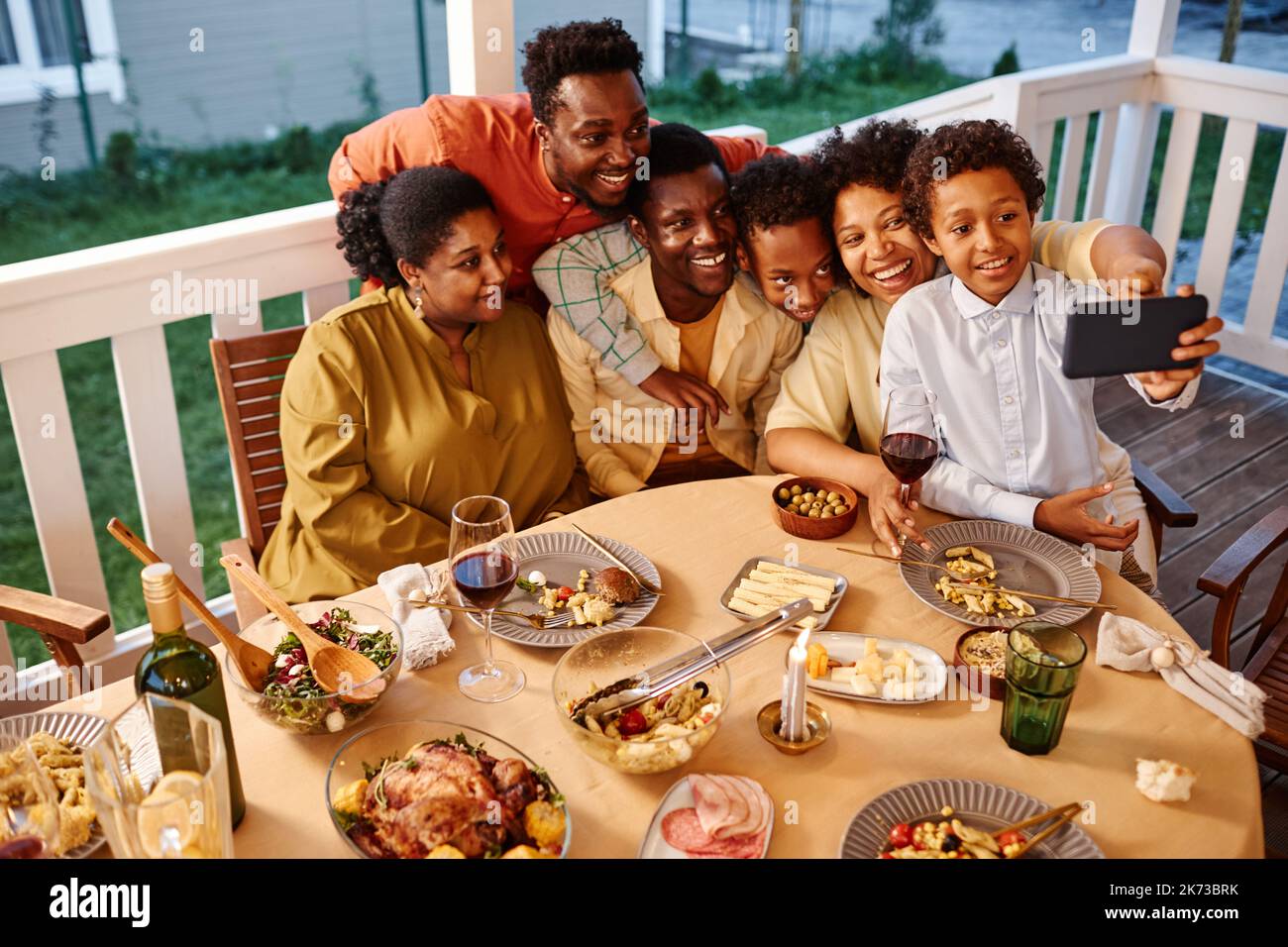 High angle portrait of happy African American family taking selfie ...