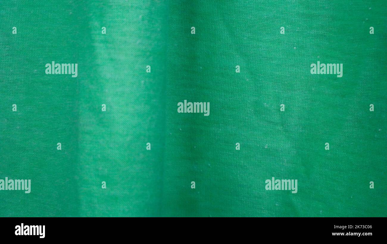 Green cloth texture as background Stock Photo - Alamy