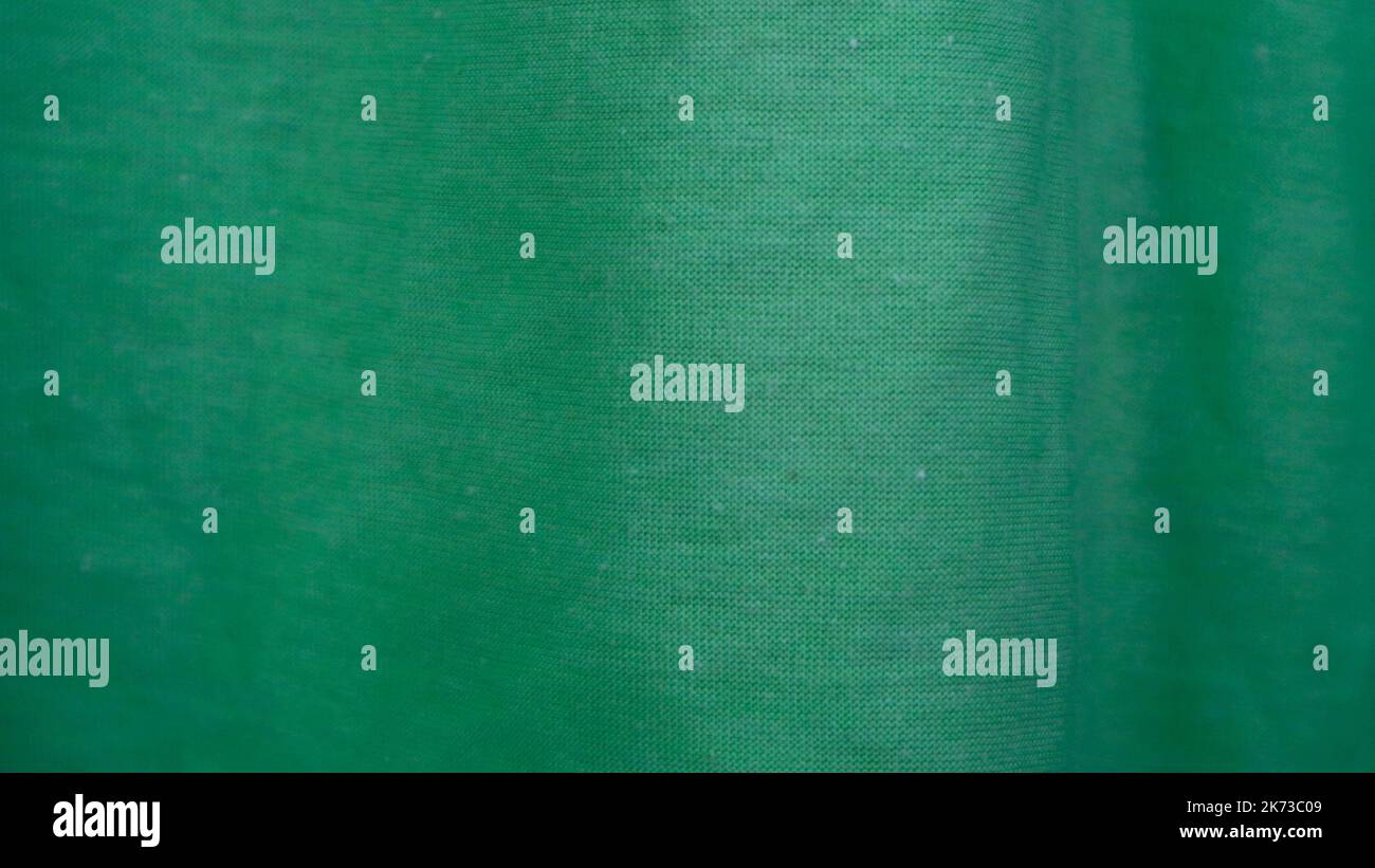 Green cloth texture as background Stock Photo - Alamy