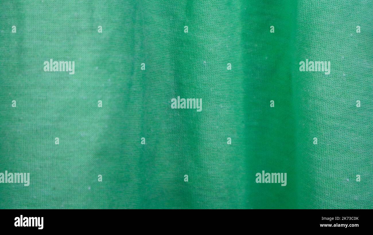 Green cloth texture as background Stock Photo - Alamy