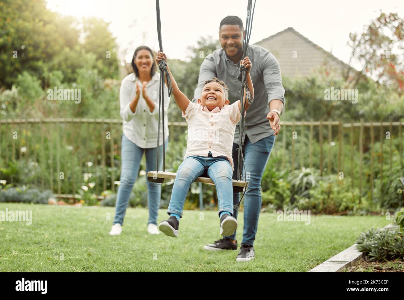 Family is the most important thing in the world. parents playing with ...