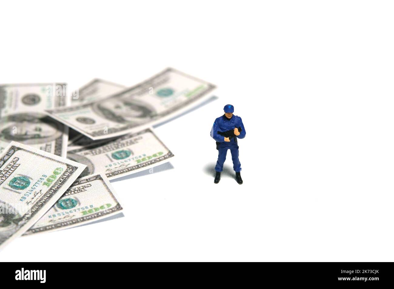 Miniature people toy figure photography. Money transfer security ...