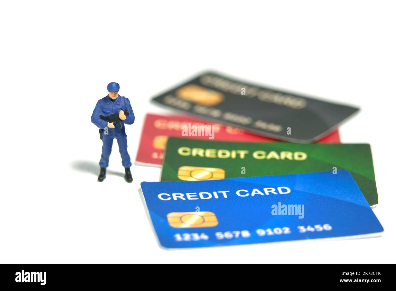 Miniature people toy figure photography. Financial transaction security ...