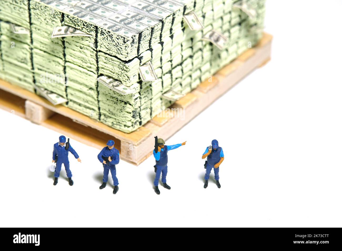 Miniature people toy figure photography. Money transfer security ...