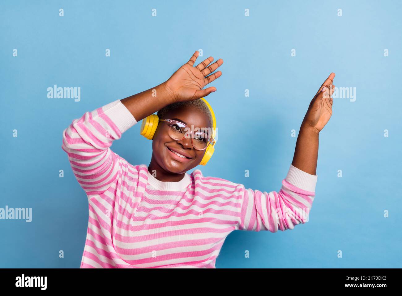 Photo of young dancing lady hold hands up celebrating buy new ...