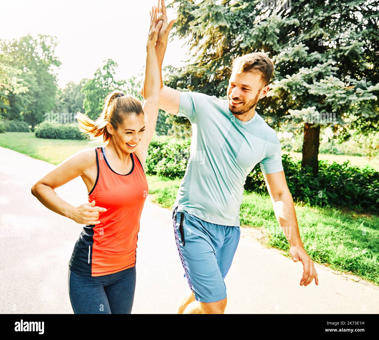 fitness woman park exercise lifestyle outdoor sport healthy couple ...