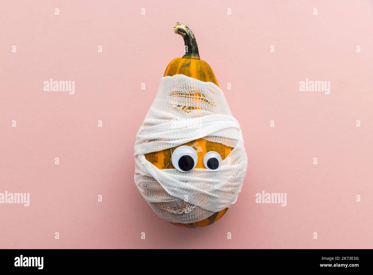 Hallowwen holiday background concept. Gourd pumpkins dressed as scary ...